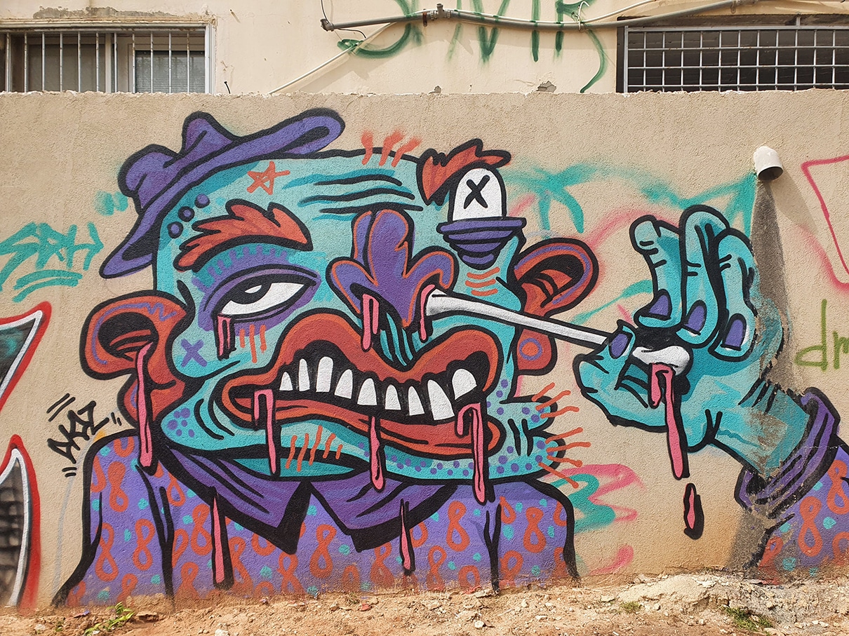 DIOZ - Reveals teeth and craze - Street Art & Graffiti - Dror Hadadi